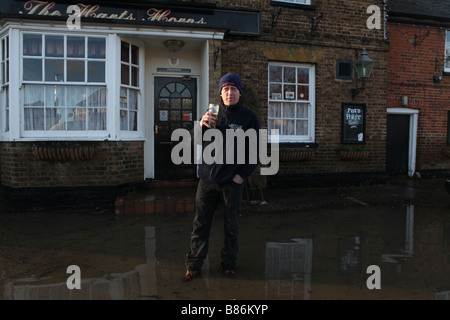 man drinking beer in the rain in a pub beer garden Stock Photo - Alamy