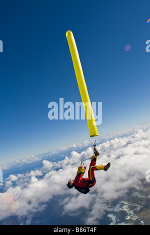 Skydive tube jump over Oahu, Hawaii, USA. Groupe is flying around Stock ...