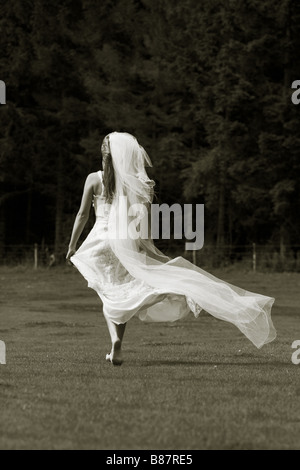 Bride runs away Stock Photo - Alamy