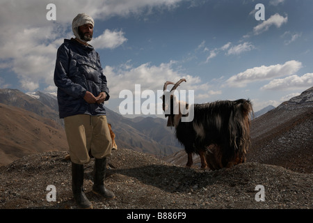 Iranian farmer with goat Stock Photo - Alamy