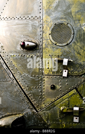 Military green metal plates background texture with seams and rivets ...