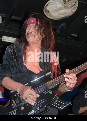 Rock musician performing at concert Stock Photo - Alamy