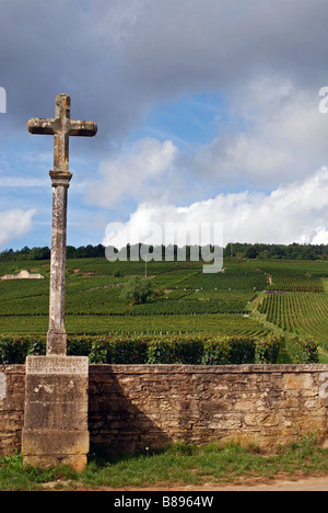 The cross at the foot of Romanée Conti vineyard, Vosne Romanée, Cote de ...