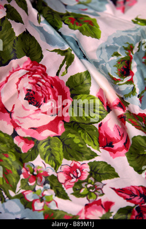 Antique lace, vintage cabbage rose fabric draped with various shades of ...