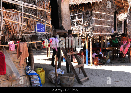 Moken sea gypsy family in a small island village off the coast of south ...