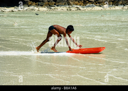 Sea gypsy, Moken boy on a fishing boat, Mergui Archipelago, Andaman Sea ...