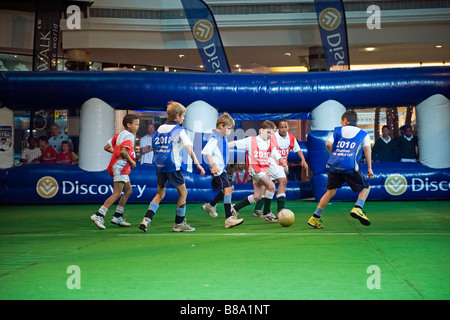Indoor football soccer match for children. Youth soccer team together ...