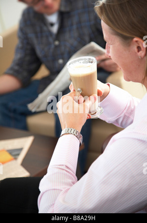 hand holding hot drink in winter season with Christmas background ...