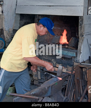 CHINESE BLACKSMITH 2 Stock Photo - Alamy