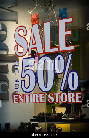 A discount store in Chelsea in New York displays in its window on ...