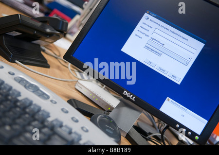 Computer monitor and keyboard displaying Symantec endpoint encryption ...