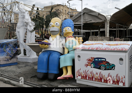 Life size sculptures of the popular television cartoon characters Homer ...
