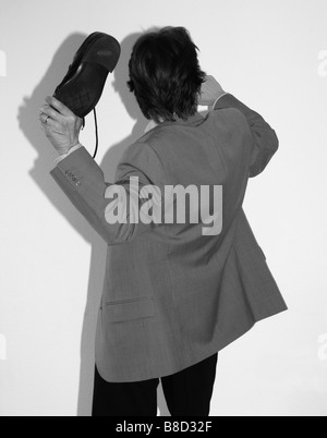 Image portraying the action of throwing a shoe, Arab insult Stock Photo ...