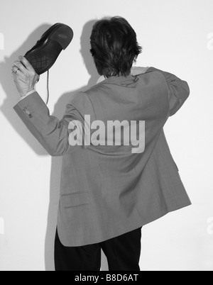 Image portraying the action of throwing a shoe, Arab insult Stock Photo ...