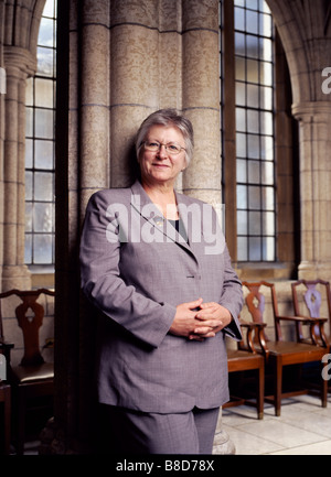 Canadian Auditor General Sheila Fraser holds up her March 2004 report ...