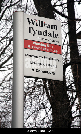 Walking School Bus Route sign painted on pavement Stock Photo - Alamy