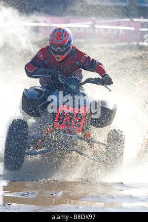 Competitor riding a quad bike at the Weston Beach Race, Weston-Super ...