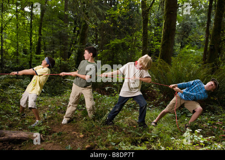 children pulling the rope outdoors Stock Photo - Alamy