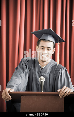 Young man giving speech at graduation Stock Photo - Alamy