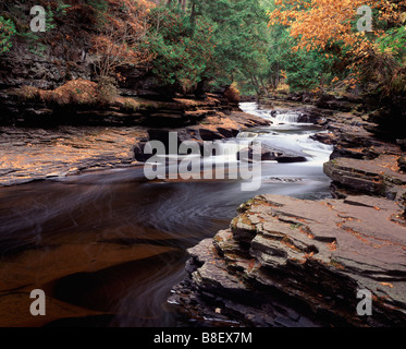 The Presque Isle River of the Upper Peninsula of Michigan is an autumn ...