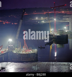 Two circular sheet-piled cofferdams built in the River Medway provide a ...
