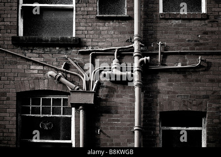 drain pipes and guttering coming from an old victorian building Stock ...