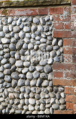 Traditional North Norfolk flint wall built using rounded cobbles ...
