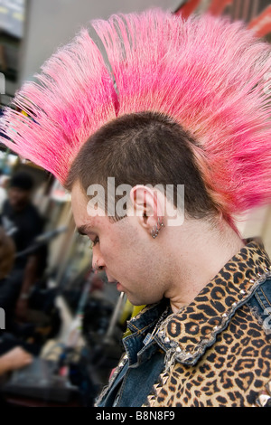 Young punk with pink Mohawk hairstyle Stock Photo - Alamy