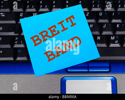 Memo note on notebook, broadband Stock Photo - Alamy