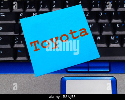 Memo note on notebook, Toyota Stock Photo - Alamy