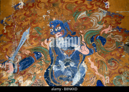 Ancient mural painting of a three-eyed demon. The demon has various ...