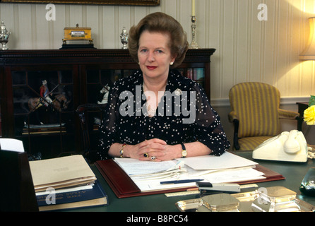 Prime Minister Margaret Thatcher at her desk in 10 Downing Street ...