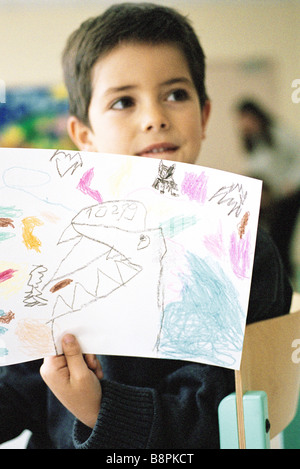 Students showing drawings in classroom Stock Photo - Alamy