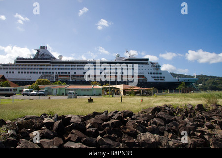 A cruise ship docked at Pointe Seraphine premier duty-free shopping ...