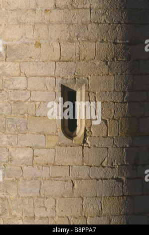 arrow slit windows in a wall of The Tower of London Stock Photo - Alamy