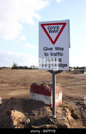 sign reading give way to traffic leaving weighbridge at cromwell quarry ...