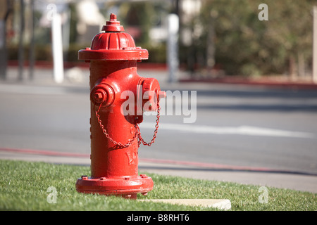 Typical american red fire hydrant Stock Photo - Alamy