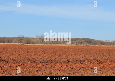 Red clay soil plowed field in Oklahoma Stock Photo - Alamy