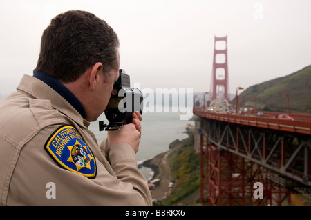 Golden Gate Bridge Police patrol car policeman cop Stock Photo - Alamy