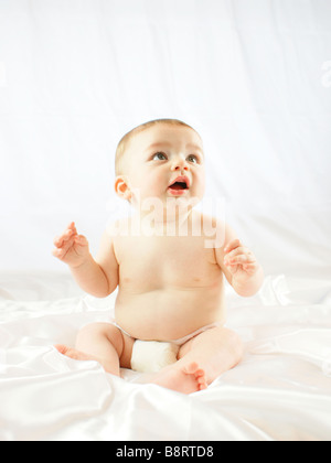 Baby boy in nappy Stock Photo - Alamy