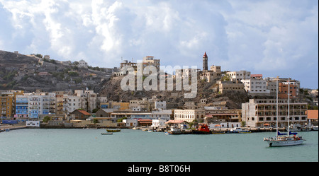 Yemen, Middle East: a boat and the cliffs of Ras Shuab, Shuab Bay beach ...