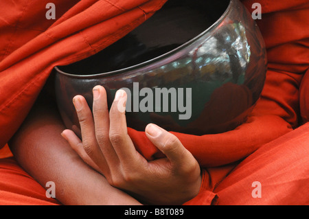 hands with begging pot, Burma Stock Photo - Alamy