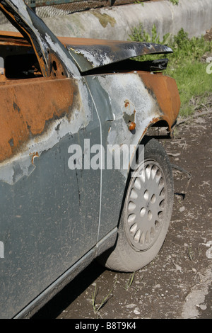 one old car destroyed by fire on street road outdoors Stock Photo - Alamy