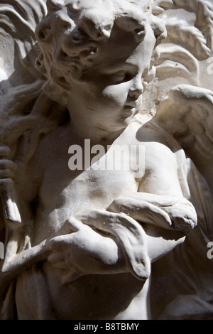 A carved alabaster cherub in the old hill town of Volterra, Tuscany ...