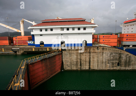 The Panama Canal lock system with lock gates closed and ship entering a ...