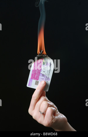 burning credit card Stock Photo - Alamy