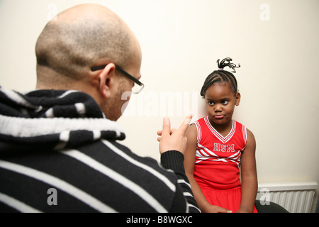 Father telling off daughter Stock Photo - Alamy