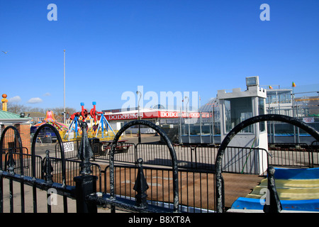 Closed down, deserted funfair rides out of season on Littlehampton ...