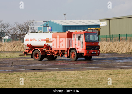Aircraft refueling tanker with Avgas parked on tarmac apron at Sandtoft ...