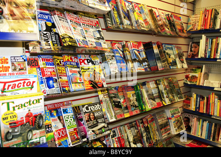 Monthly and weekly Magazines for sale on view at a store Stock Photo ...